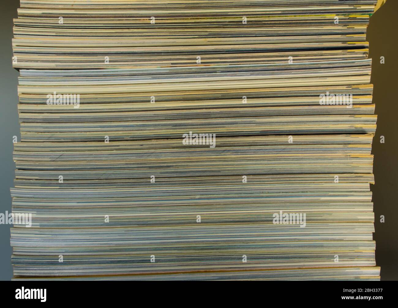 Texture of the opposite of spine of magazine pile Stock Photo - Alamy