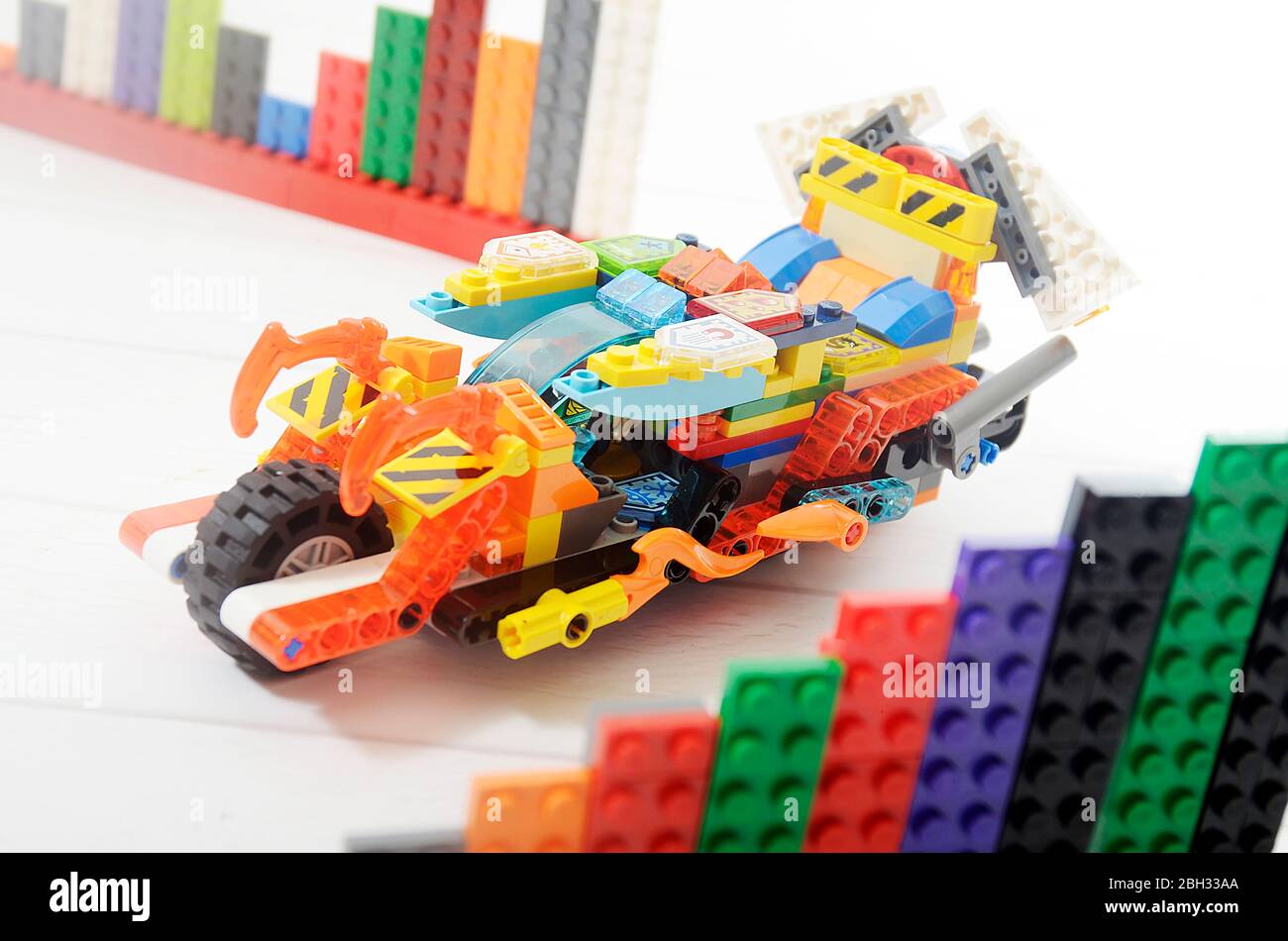 kid playing creative create car from blok, lego with mini figure Stock ...