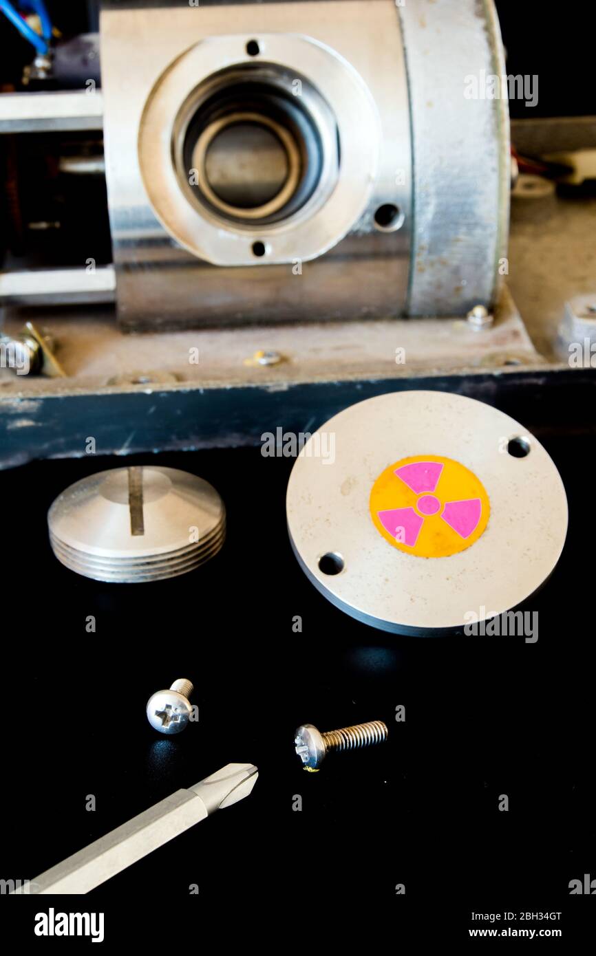 Opening the cover of Radioactive container in the part of machinery ...