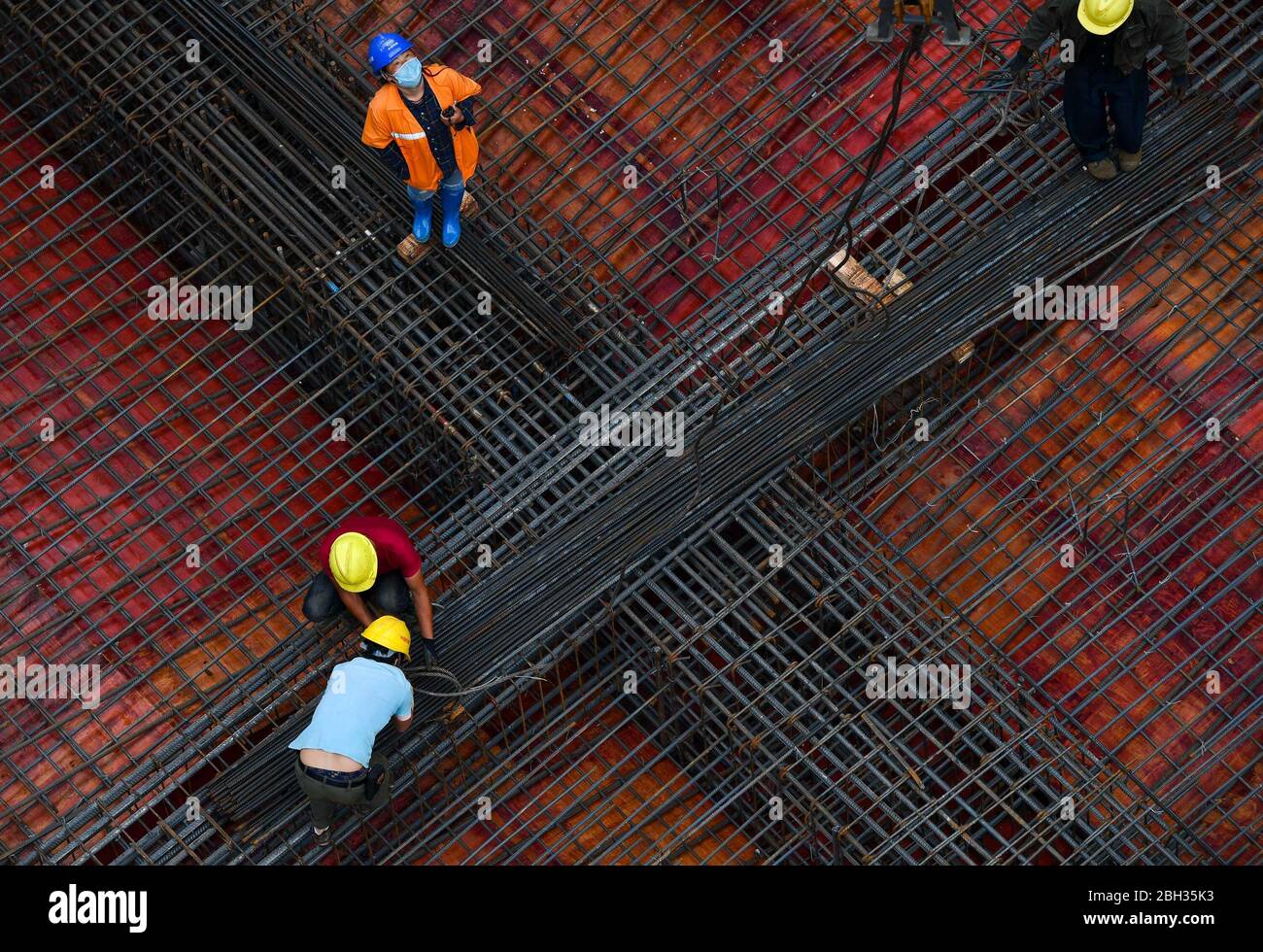 Guangzhou, China's Guangdong Province. 23rd Apr, 2020. People work at ...