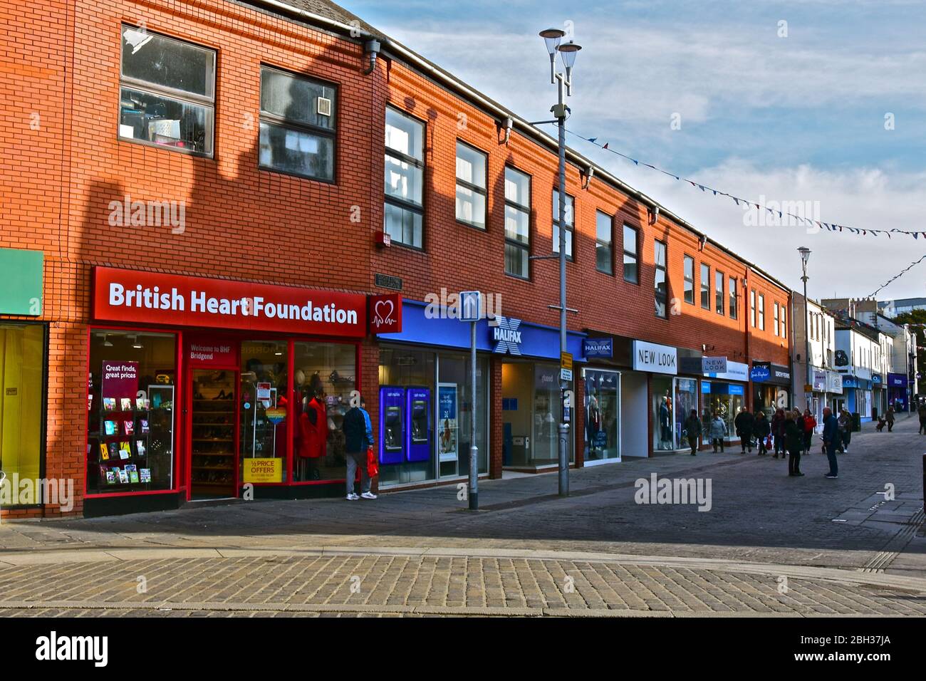 A view of modern shop units along Caroline Street, one of the main ...