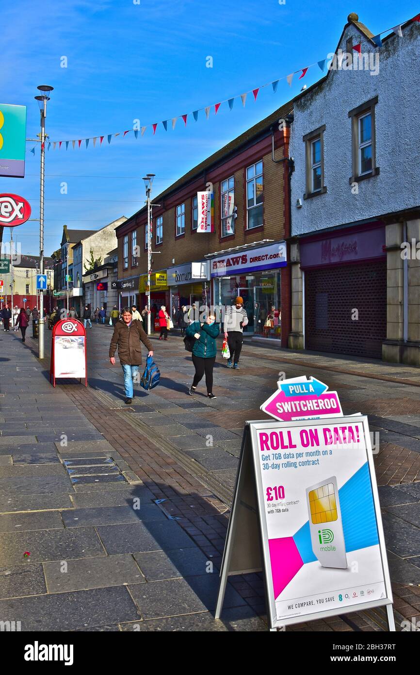 A view of shops along Adare Street, one of the main shopping areas of ...