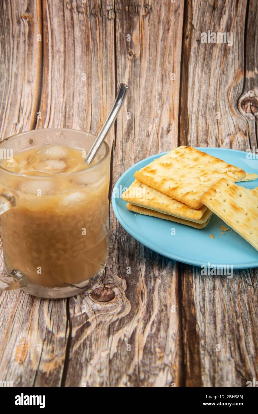Cup cold coffee crackers hi-res stock photography and images - Alamy