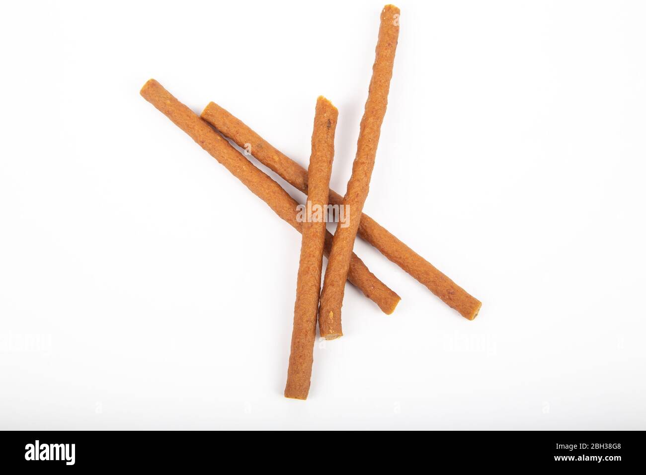 dog food stick isolated on white background Stock Photo - Alamy