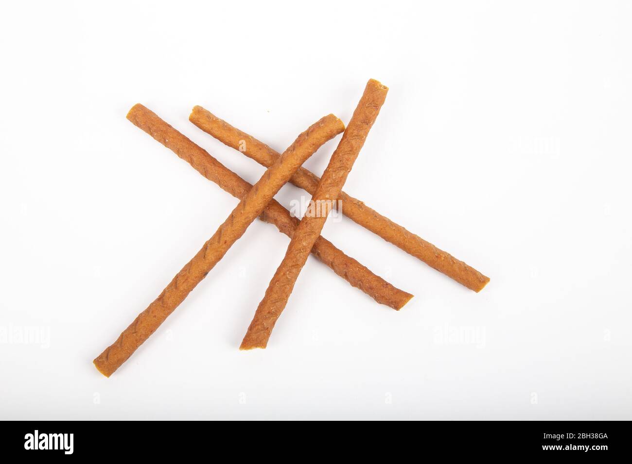 dog food stick isolated on white background Stock Photo - Alamy