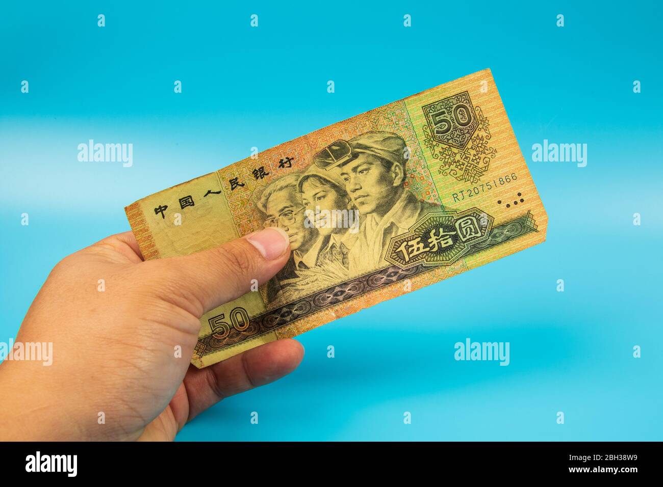 Man hold China 1980 old Banknotes. An Old paper banknote, vintage retro ...