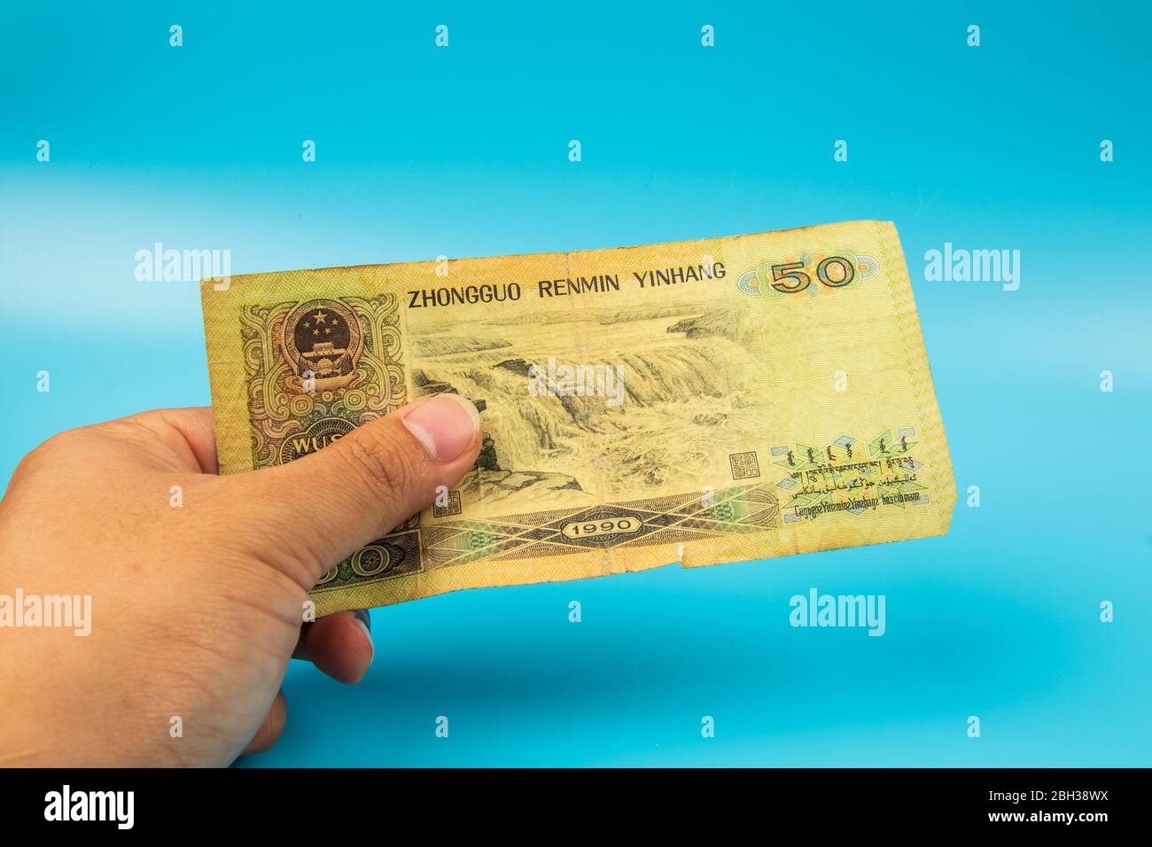 Man hold China 1980 old Banknotes. An Old paper banknote, vintage retro ...