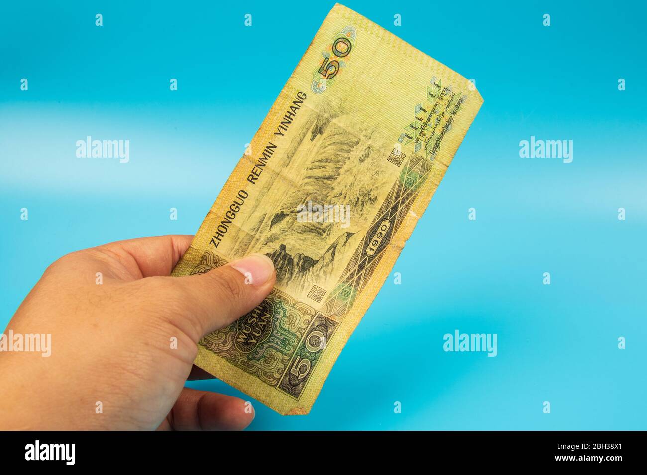 Man hold China 1980 old Banknotes. An Old paper banknote, vintage retro ...