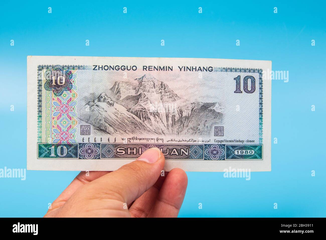 Man hold China 1980 old Banknotes. An Old paper banknote, vintage retro ...