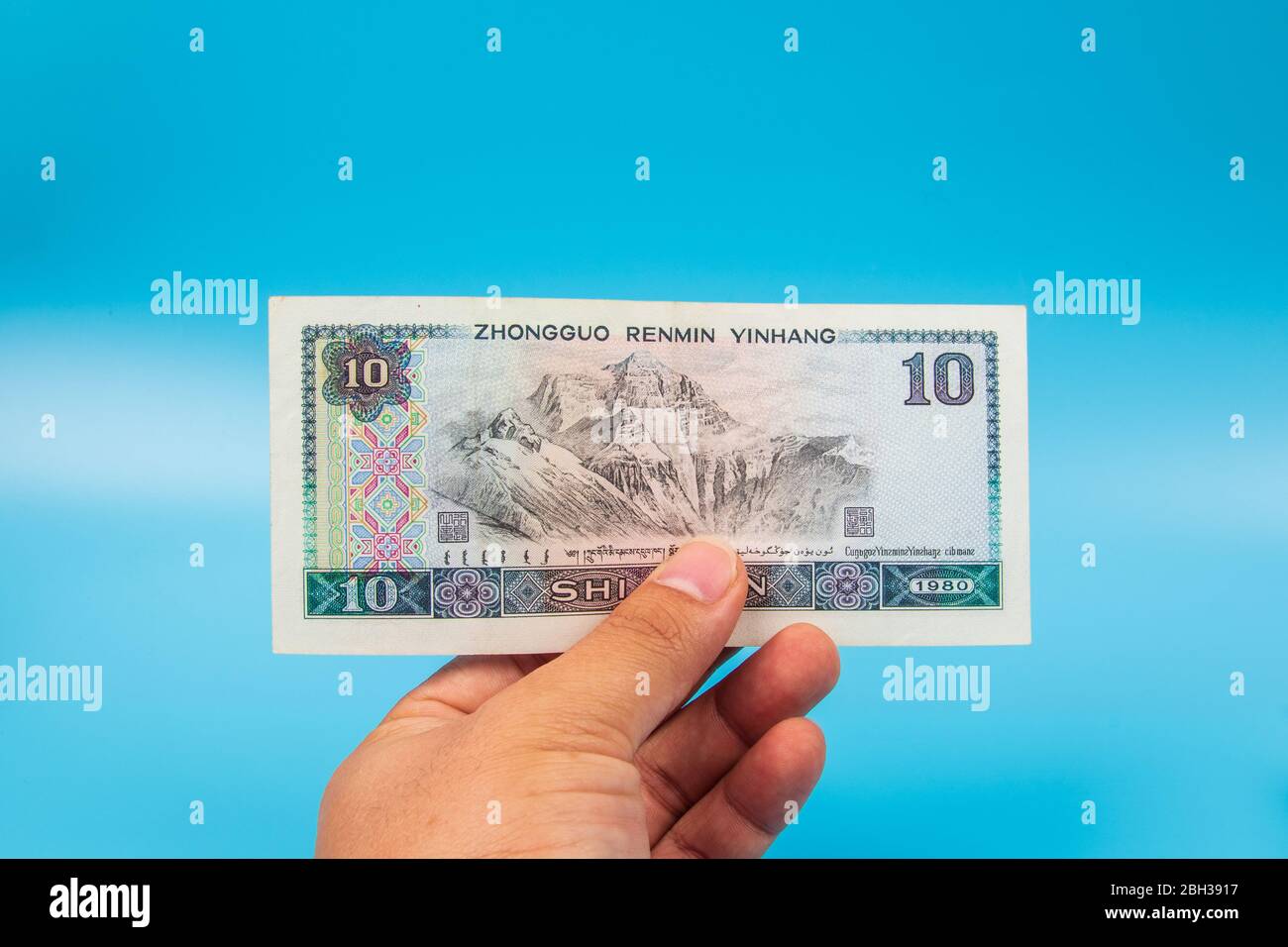Man hold China 1980 old Banknotes. An Old paper banknote, vintage retro ...