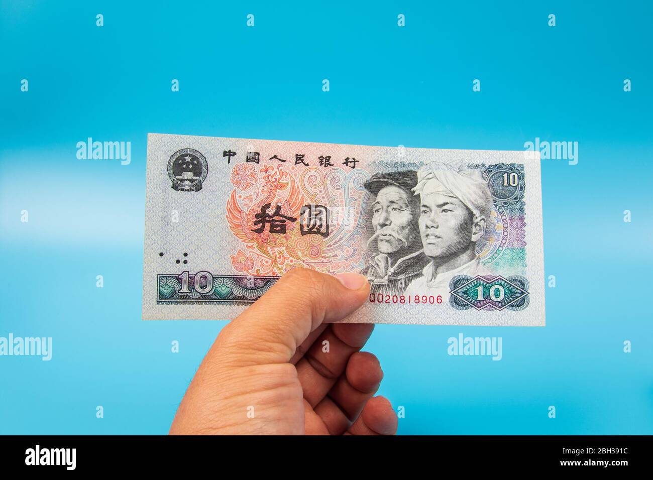 Man hold China 1980 old Banknotes. An Old paper banknote, vintage retro ...