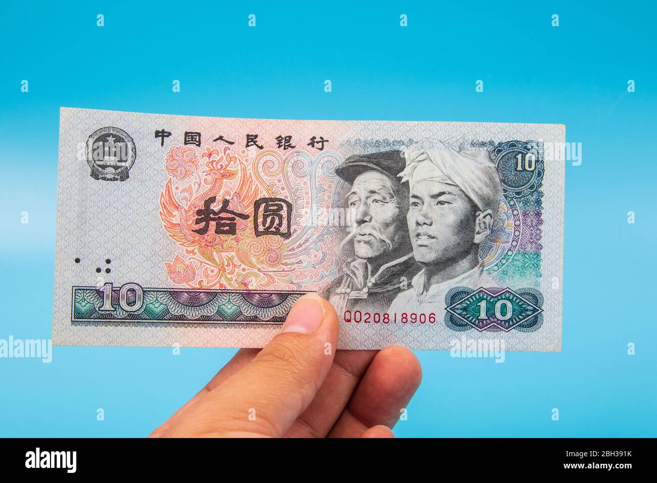 Man hold China 1980 old Banknotes. An Old paper banknote, vintage retro ...