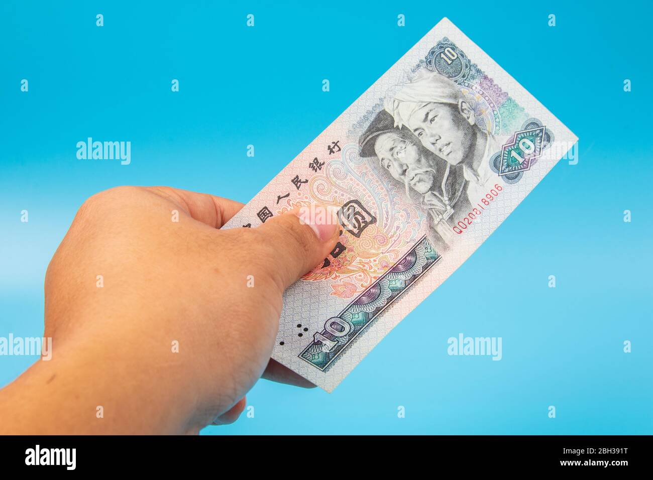 Man hold China 1980 old Banknotes. An Old paper banknote, vintage retro ...