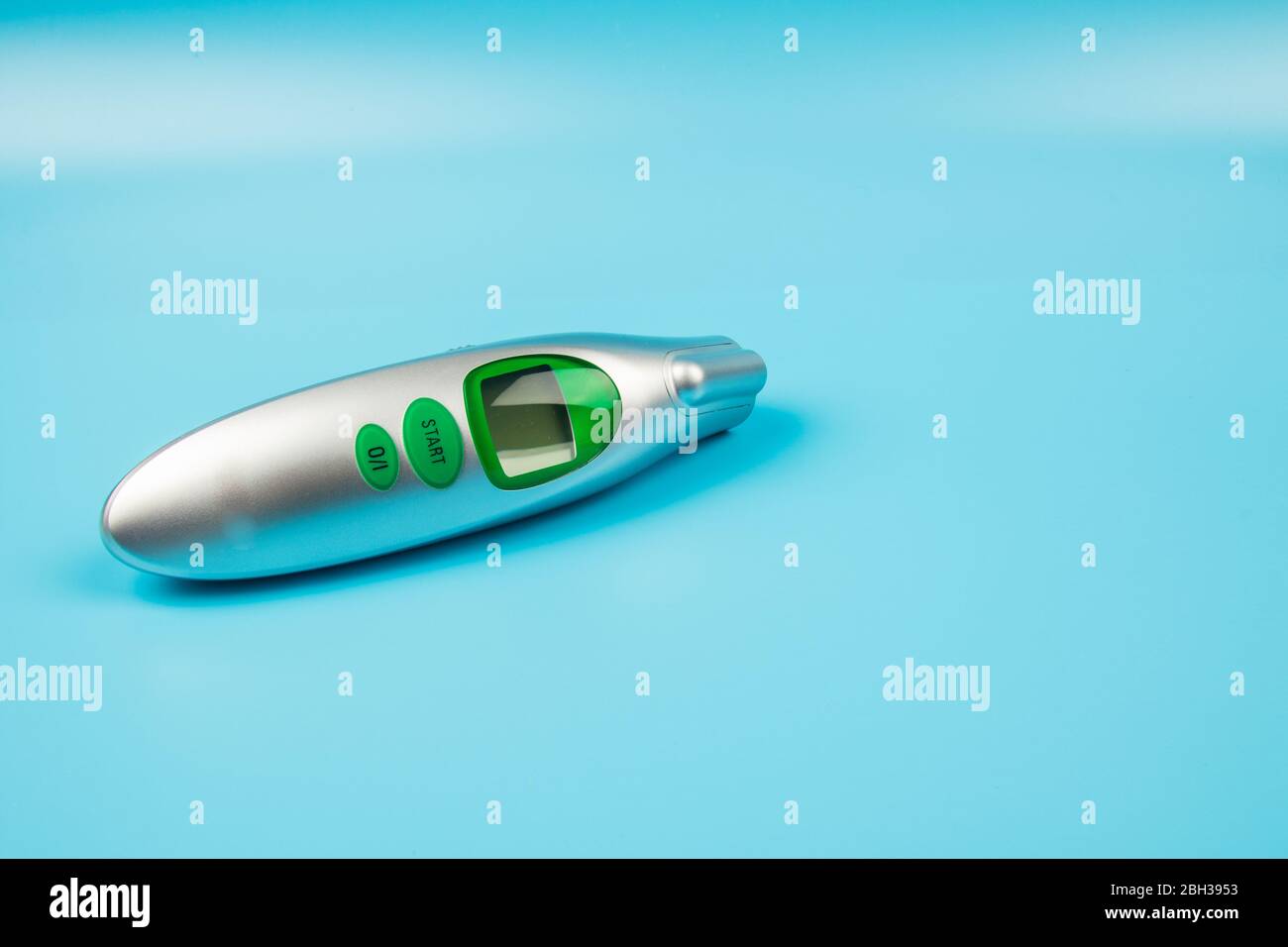 Temperature Measurement Device thermometer isolated on blue background ...