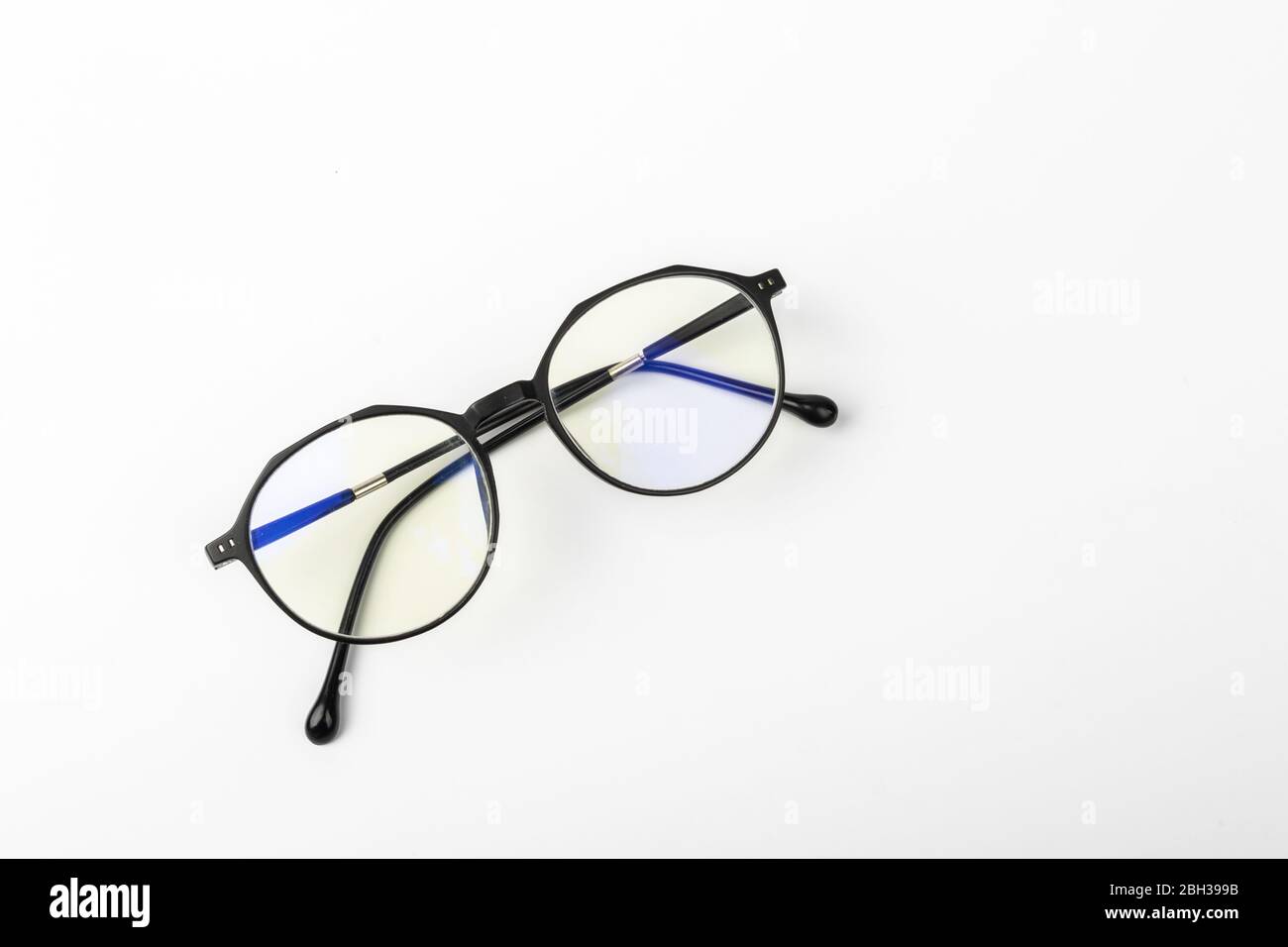 Close up black eye glasses isolated on white background Stock Photo - Alamy