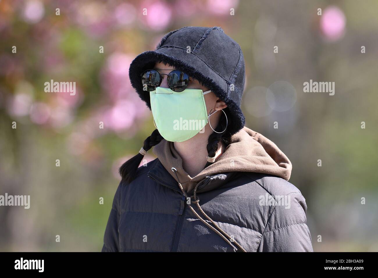Images of people wearing face masks and PPE (Personal Protective ...
