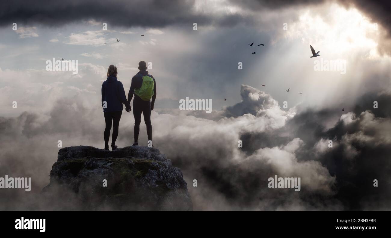 Fantasy Adventure Composite with a Couple on top of a Mountain Cliff ...