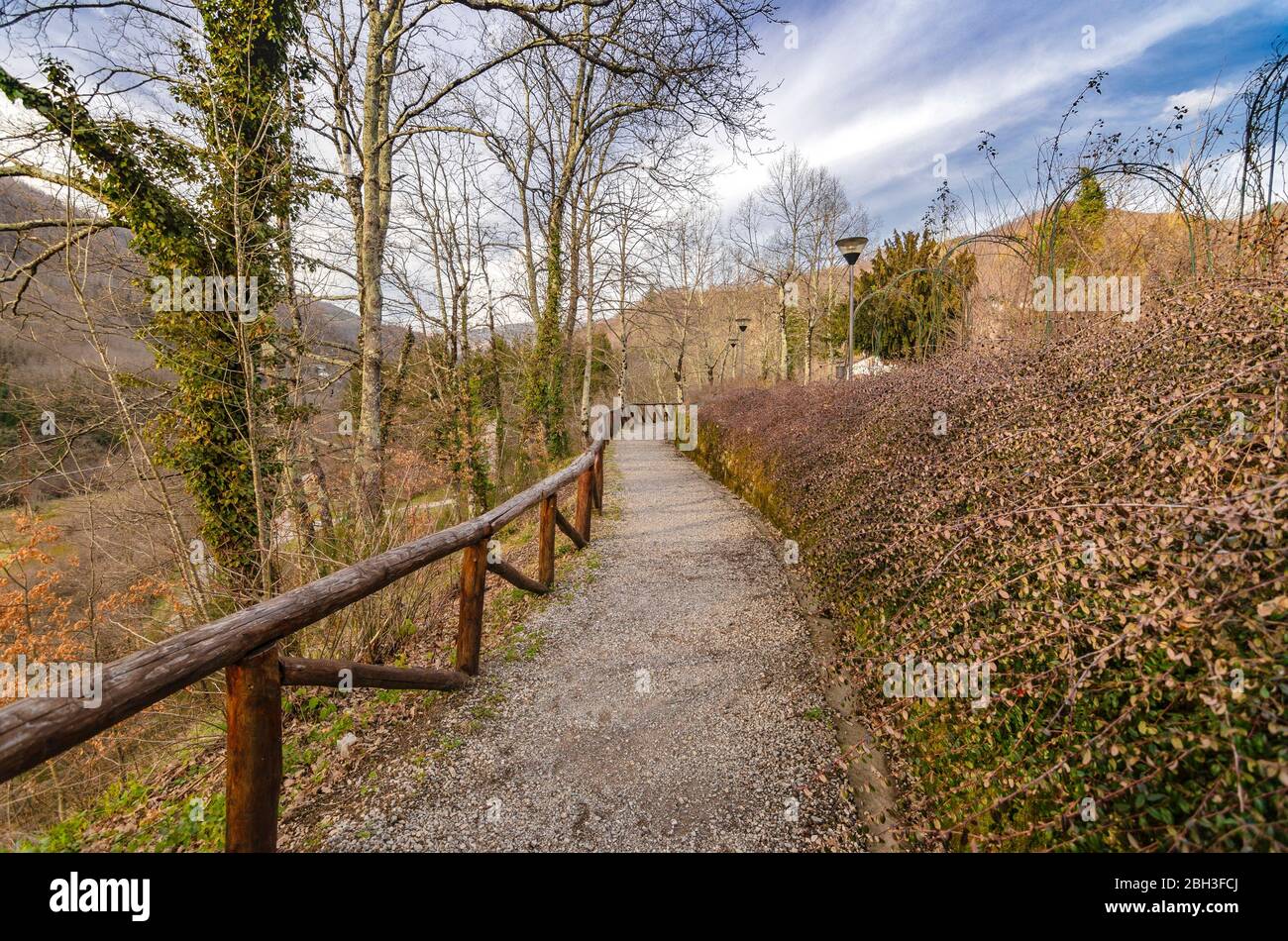 Country path with fence along the way Stock Photo - Alamy