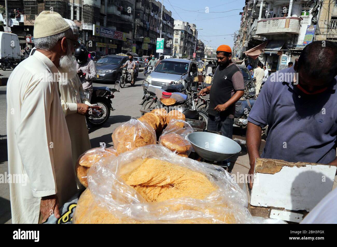 Vendor sells Khajla and Pheni (traditional dish) to earn his livelihood ...