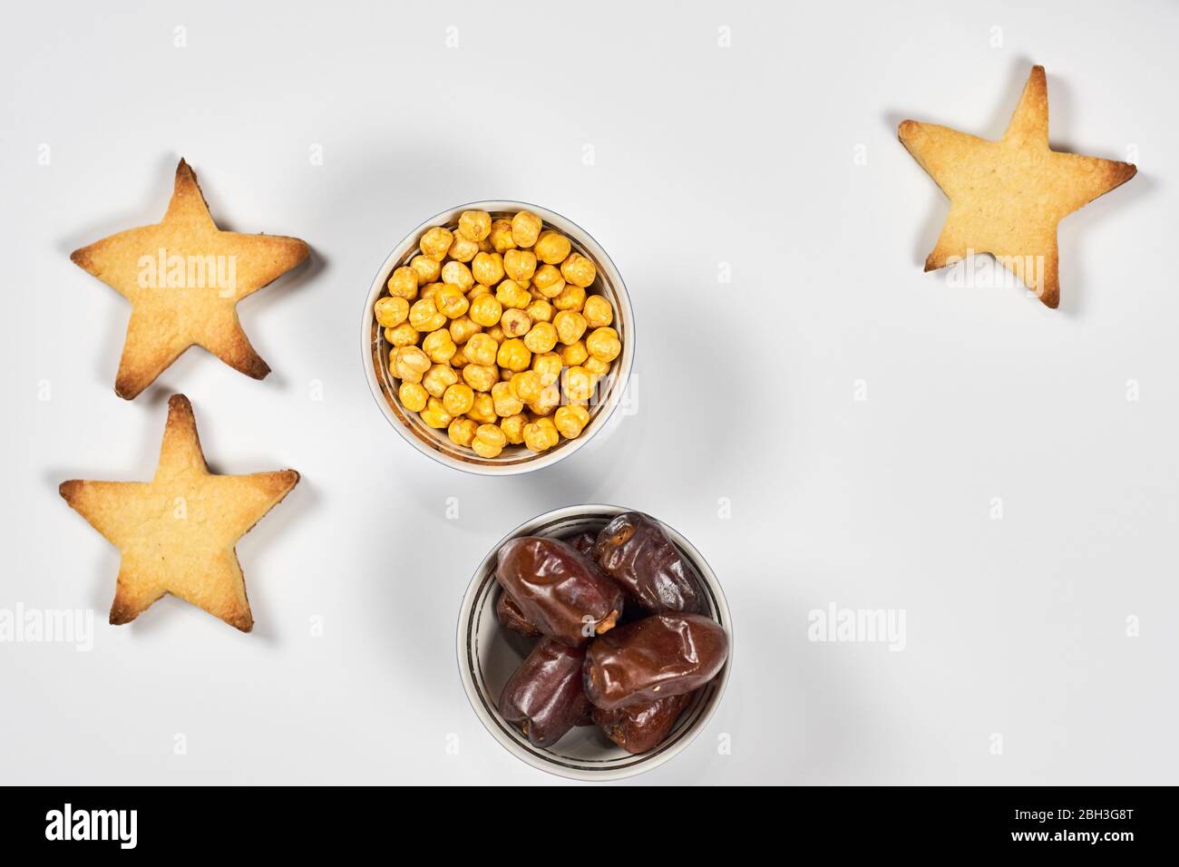 Traditional Ramadan dinner on pure white table. Traditional middle ...