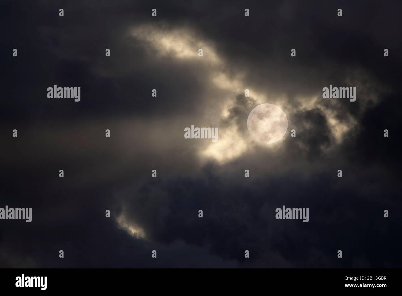 Dark overcast full moon night Stock Photo - Alamy
