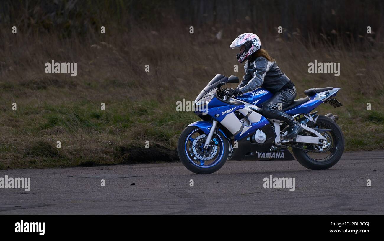 Woman riding a motorcycle hi-res stock photography and images - Alamy
