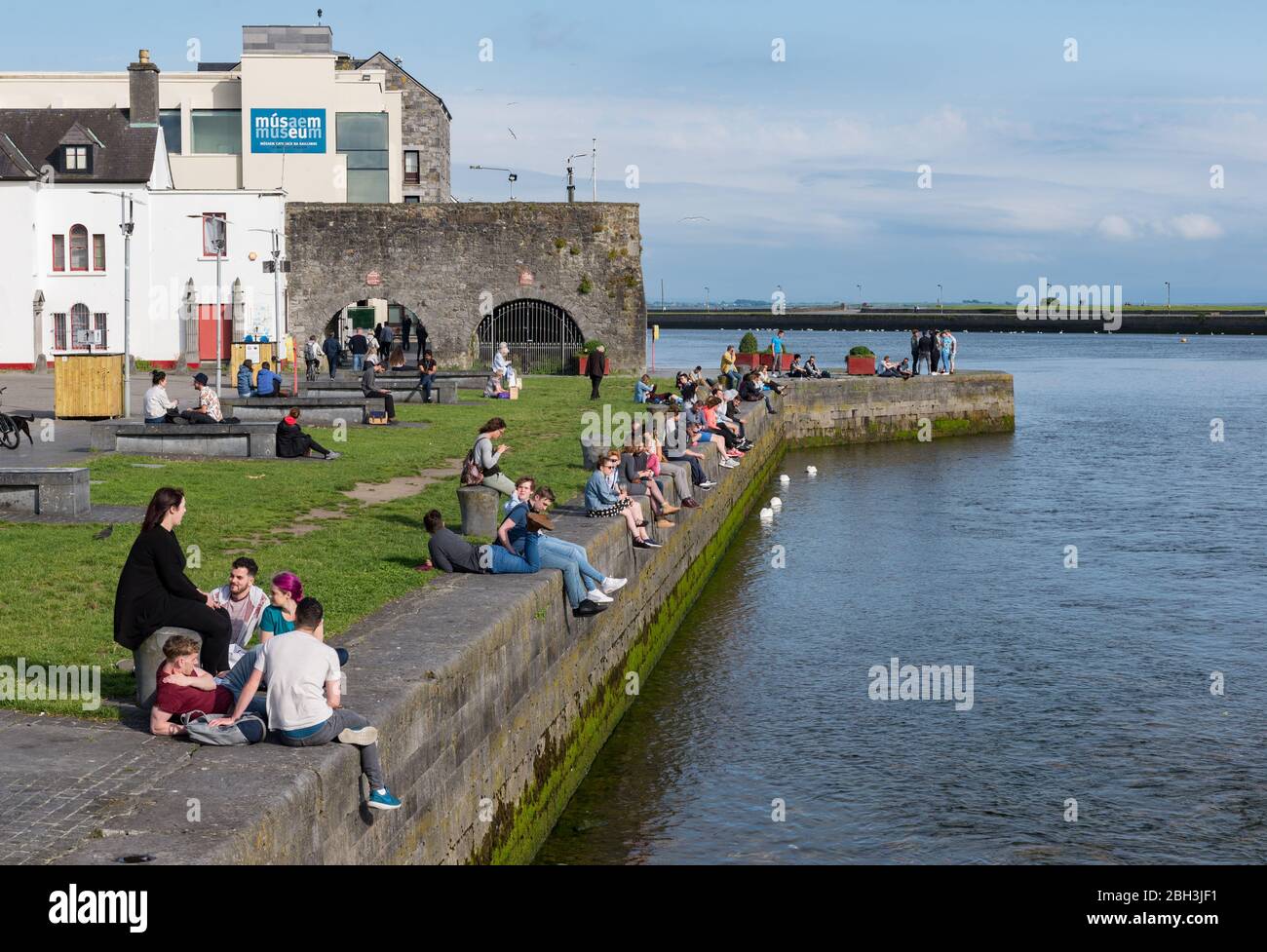 GALWAY, IRELAND - JUNE 21, 2017: People socialising and enjoying the ...