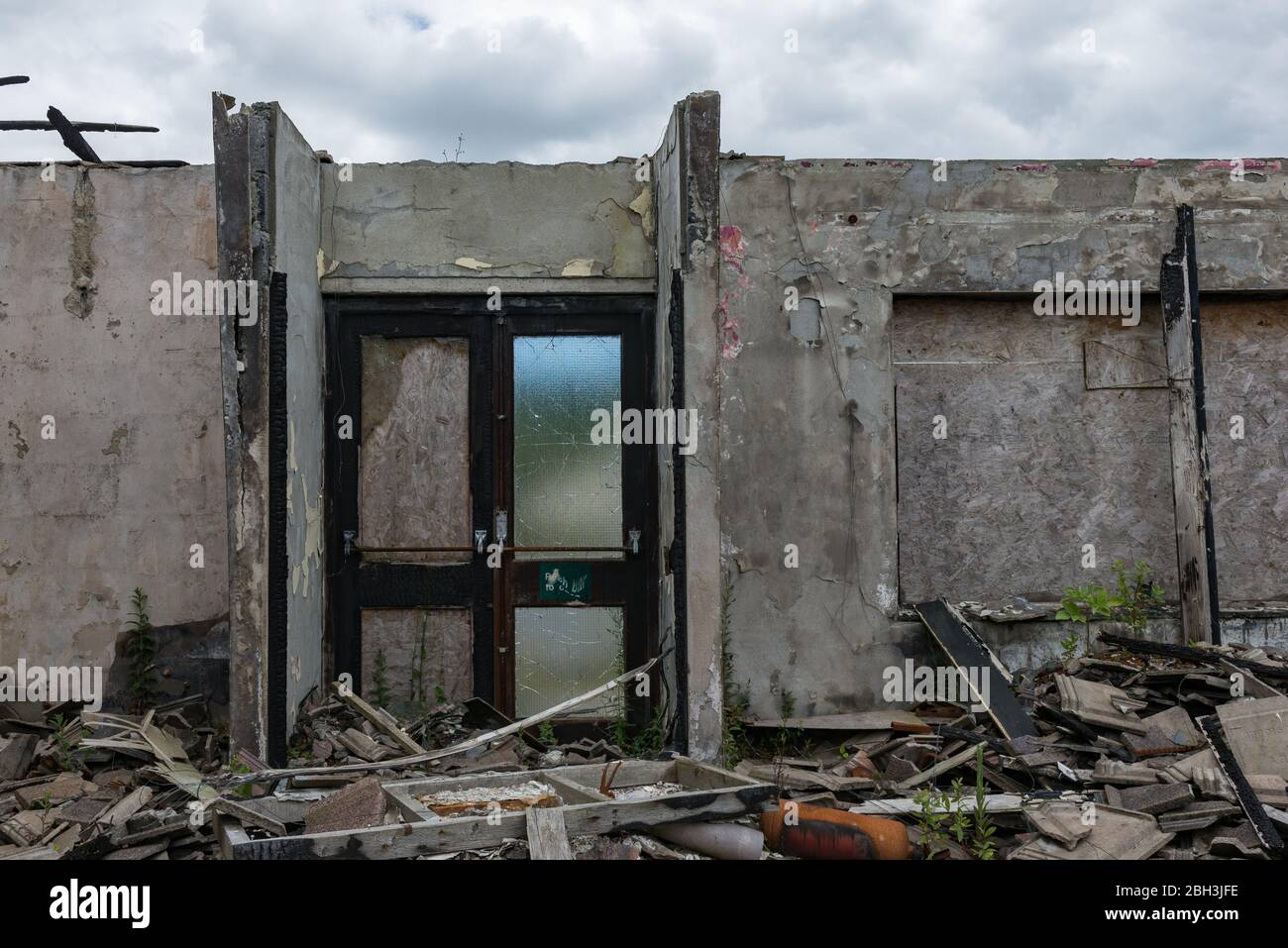 Abandoned burned out building, open cloudy skies Stock Photo - Alamy
