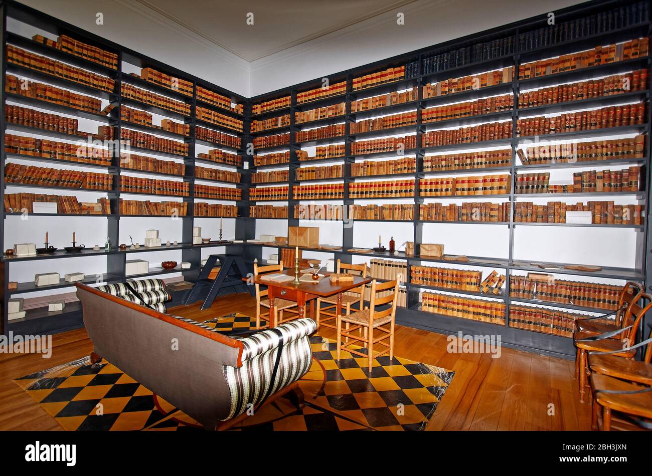 State Library, book shelves line walls, sofa, table, chairs, The Old ...