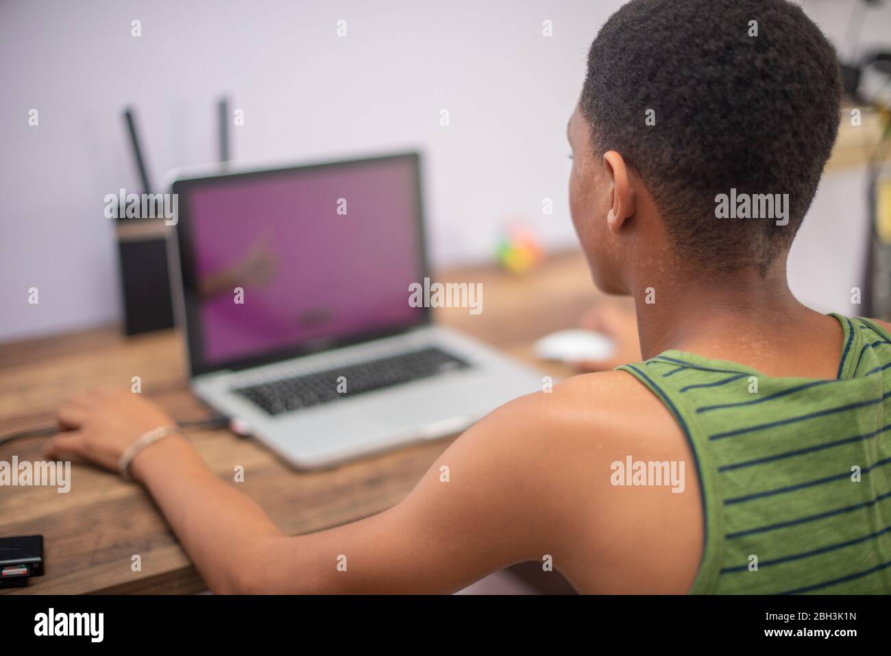 Teenager working from home during lockdown Stock Photo - Alamy