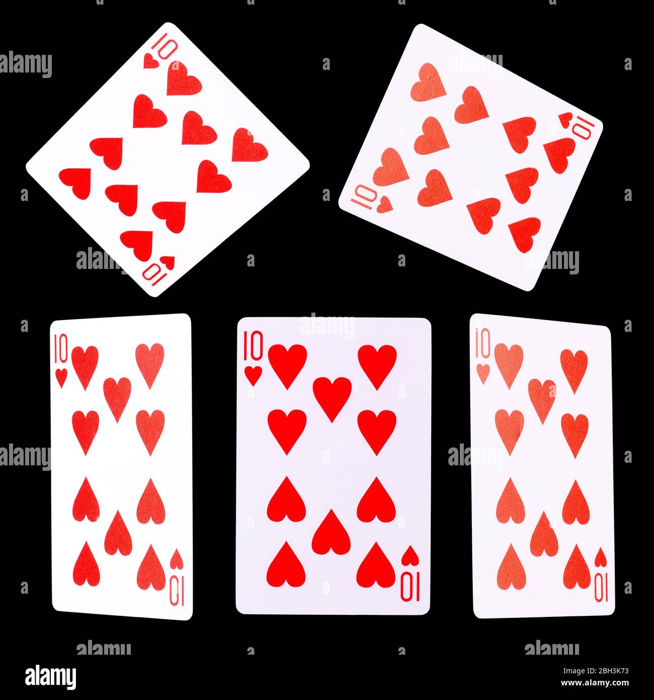Playing cards for poker game on black background with clipping path ...