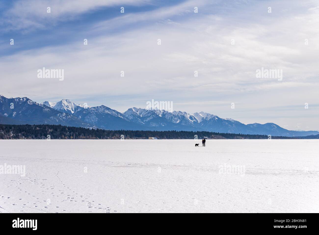 INVERMERE, CANADA - MARCH 17, 2020: frozen Windermere lake and rocky ...
