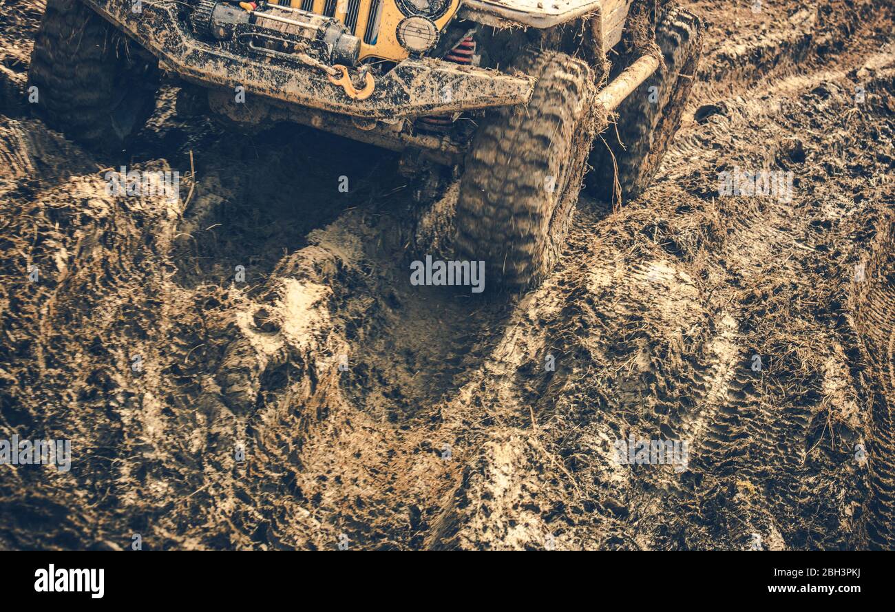 Off Road 4-Wheel All Terrain Vehicle Driving In Dirt And Mud Stock ...