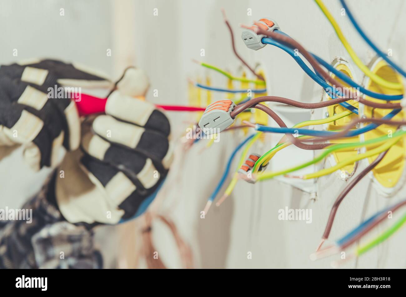 Close Up Of Electrician Assembling And Connecting Wires For Electrical ...
