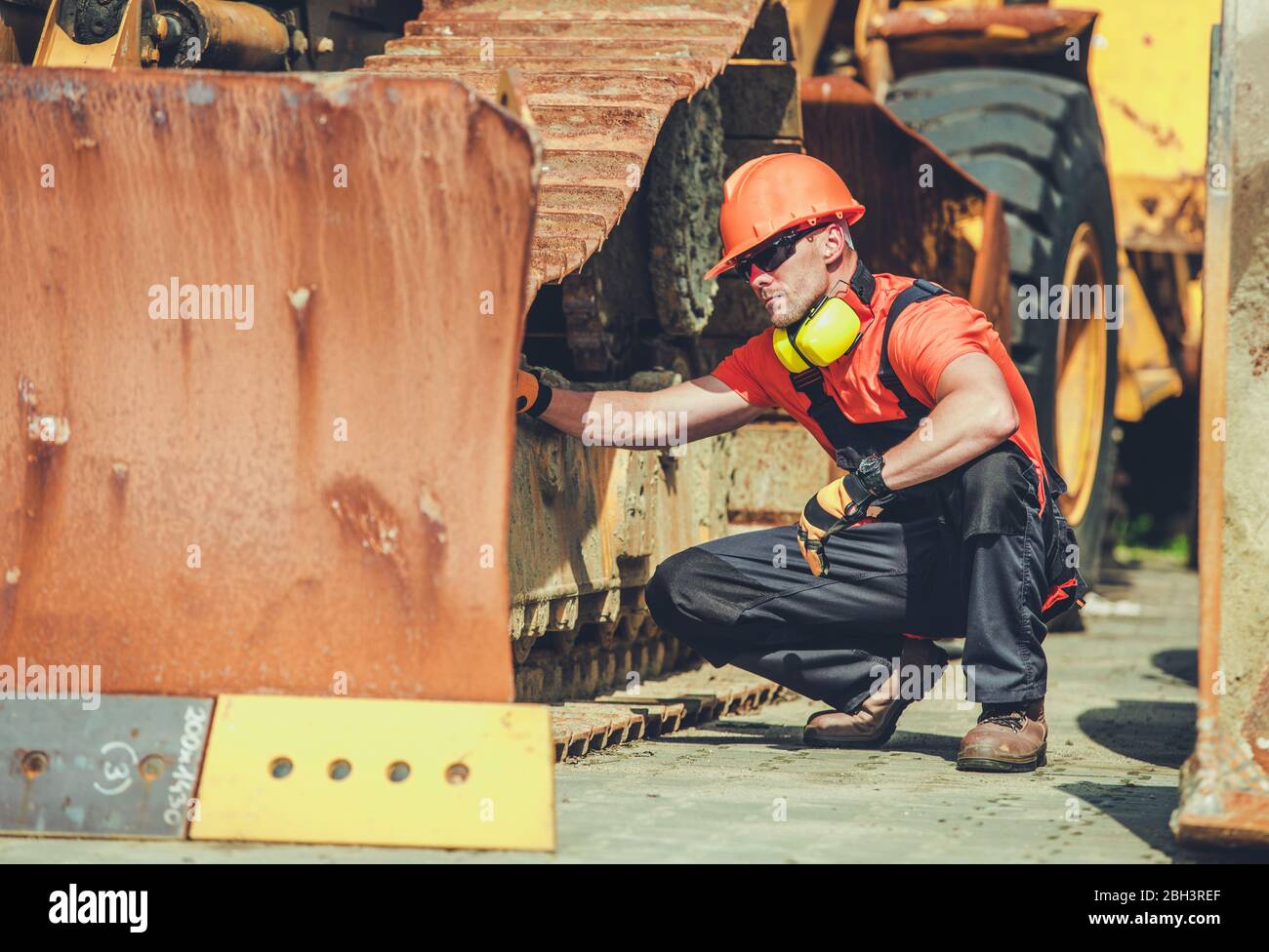 Construction Machine Operator Checks Vehicle For Safety And Mobility ...