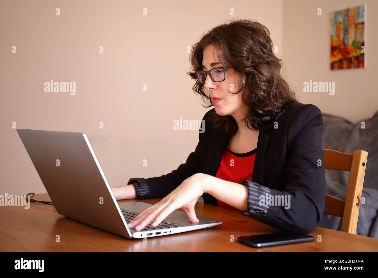Modern business woman working in the computer (PC) at the office with ...