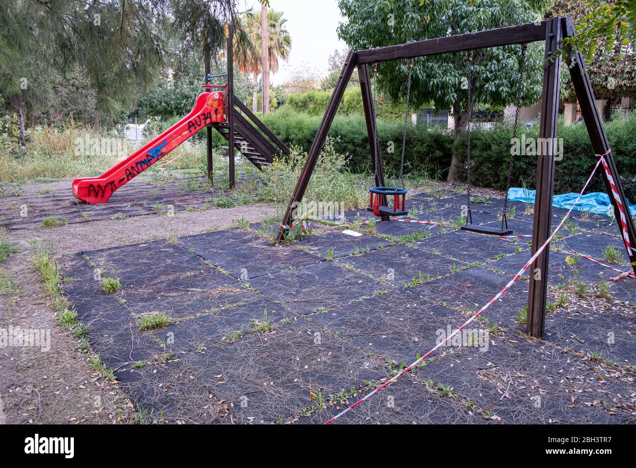 Empty deserted abandoned playground closed for protection against COVID ...