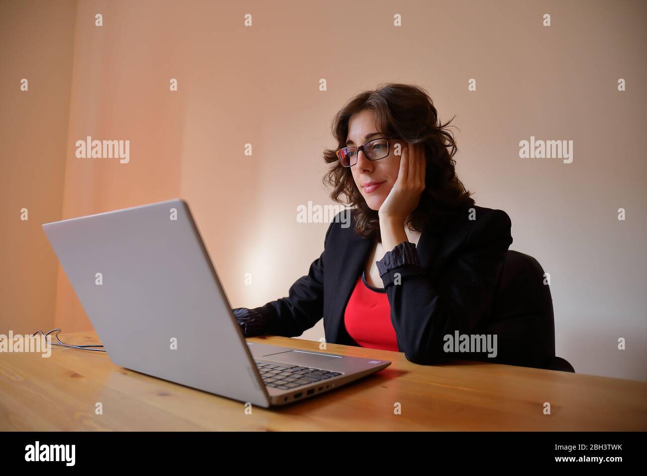 Modern business woman working in the computer (PC) at the office with ...