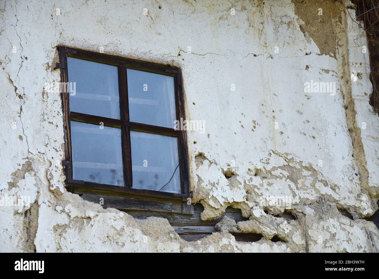 Ancient metal window on old collapsed house Stock Photo - Alamy