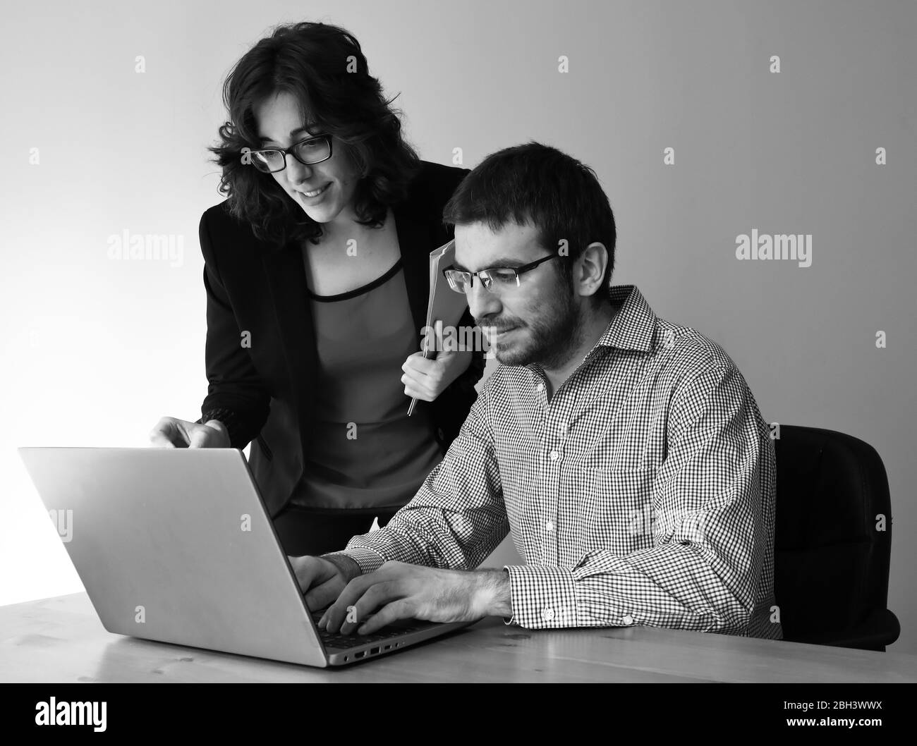 Modern business woman working in the computer (PC) at the office with ...