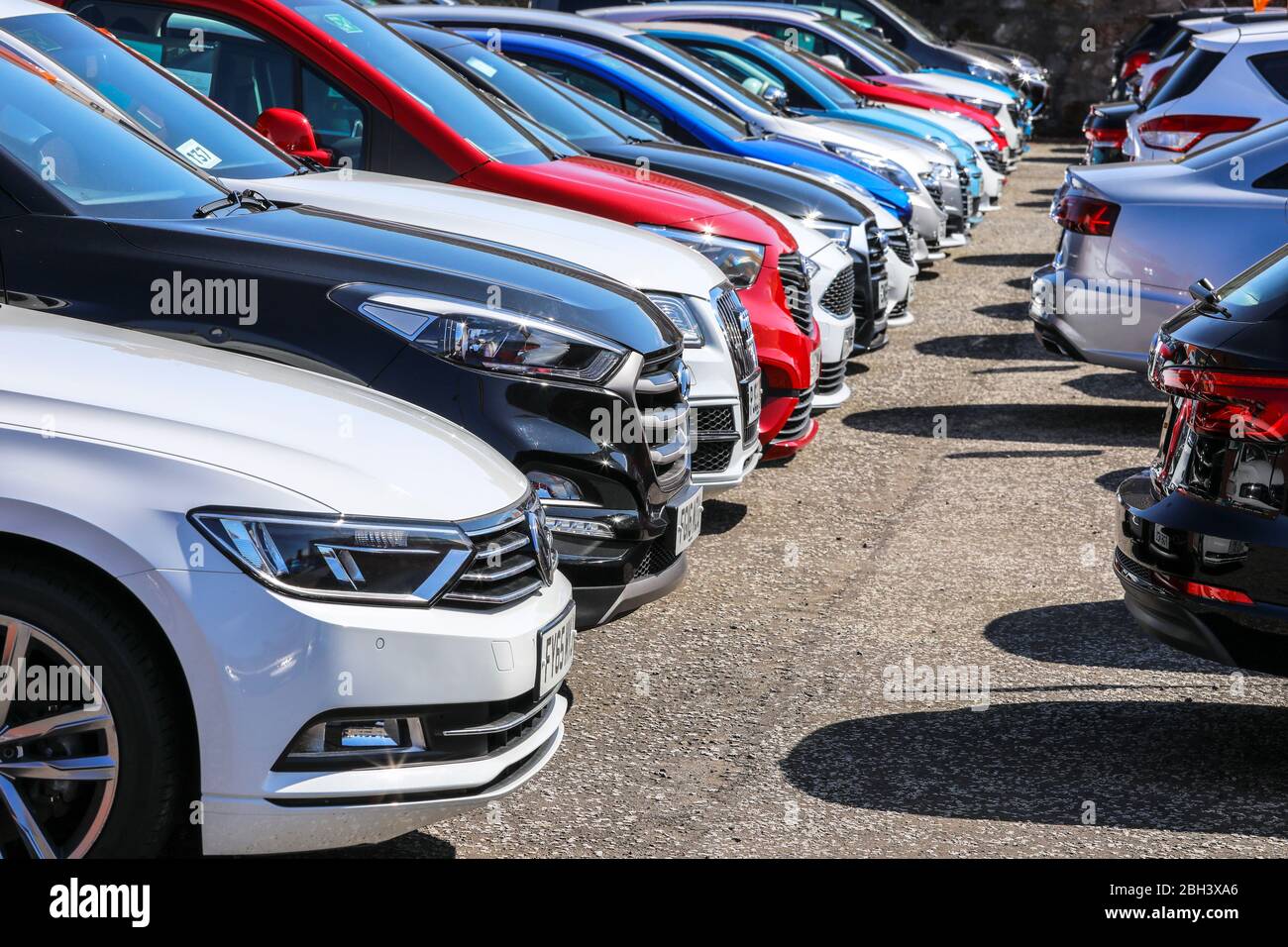 a selection of used motor cars of different manufacturers for sale in a ...