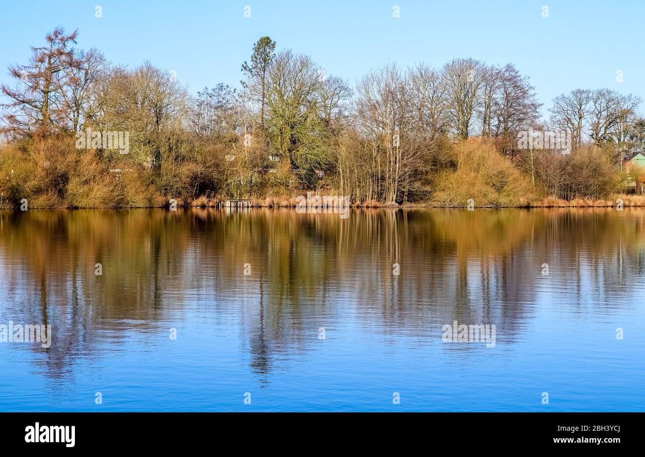 Beautiful landscape at a lake with a reflective water surface Stock ...