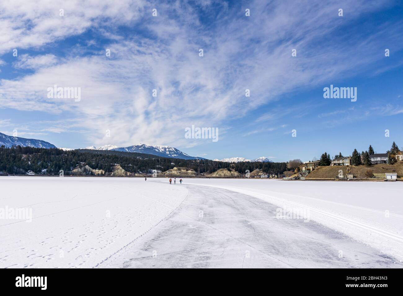 INVERMERE, CANADA - MARCH 17, 2020: frozen Windermere lake and rocky ...
