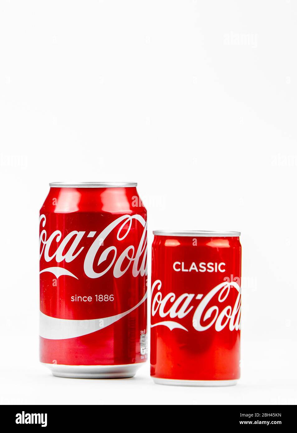Atlanta, Georgia, USA April 4, 2020: Two cans of Coca-Cola classic ...