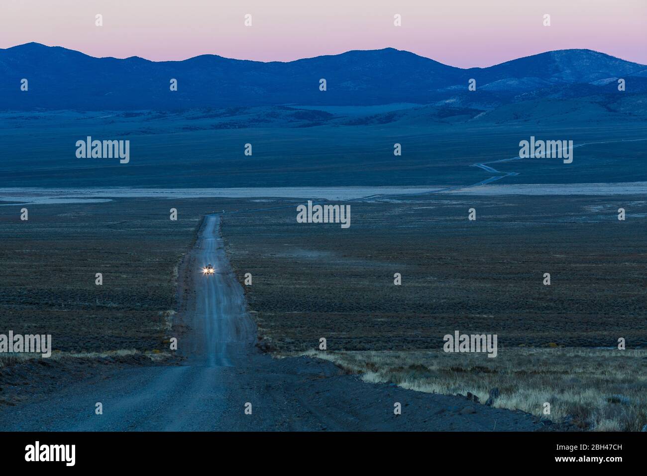 Camper van approaching the old silver and gold mining ghost town of ...