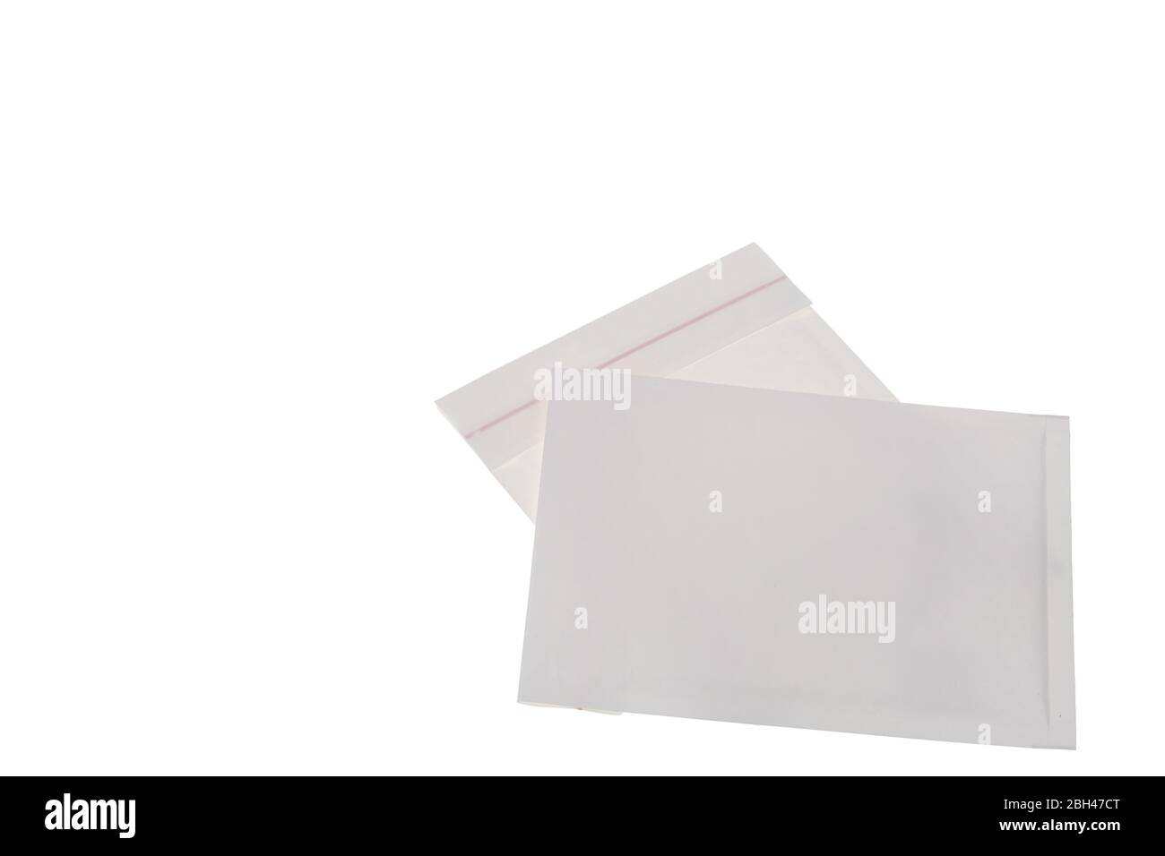 Close up view of empty white envelopes isolated. Packaging concept ...
