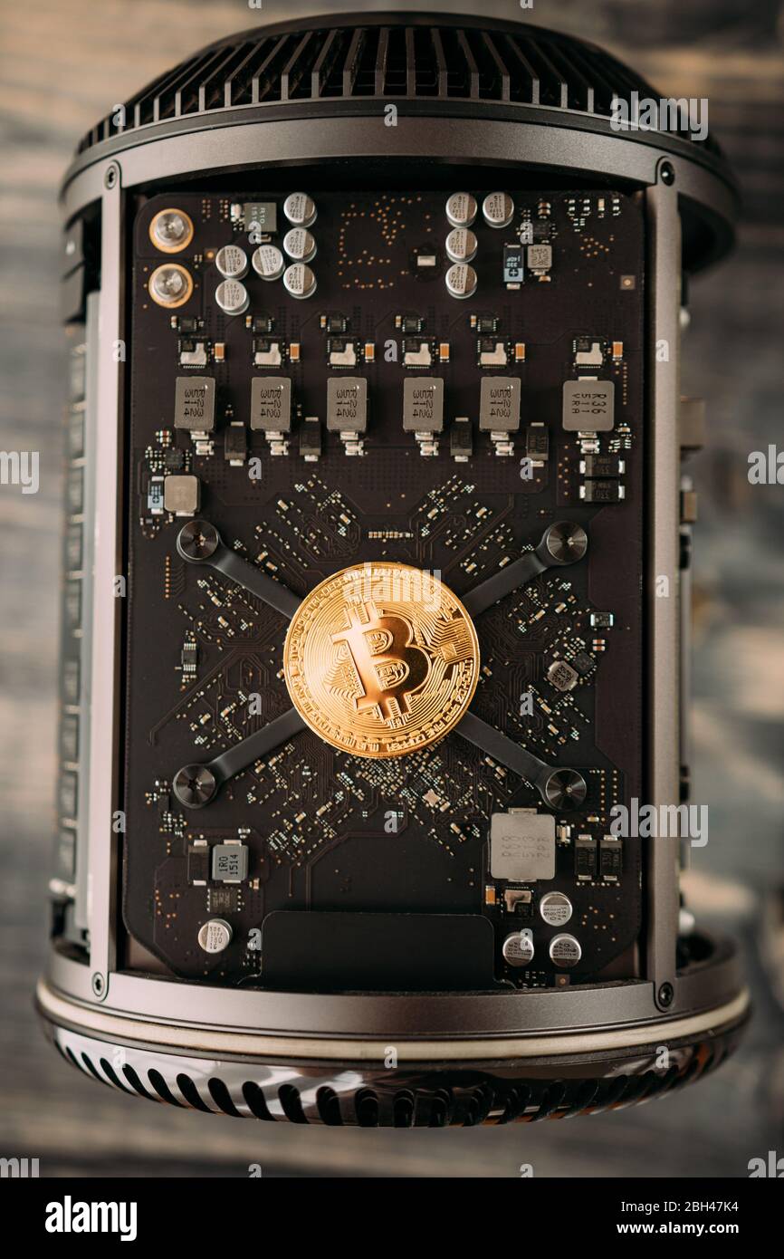 Bitcoin gold coin lies on the motherboard of the computer Stock Photo ...