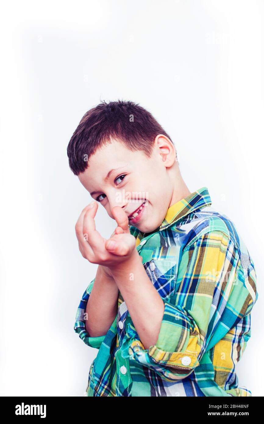 little cute real boy on white background gesture smiling close up ...