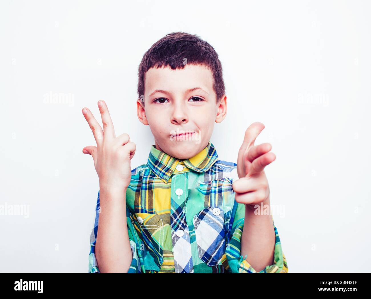 little cute real boy on white background gesture smiling close up ...