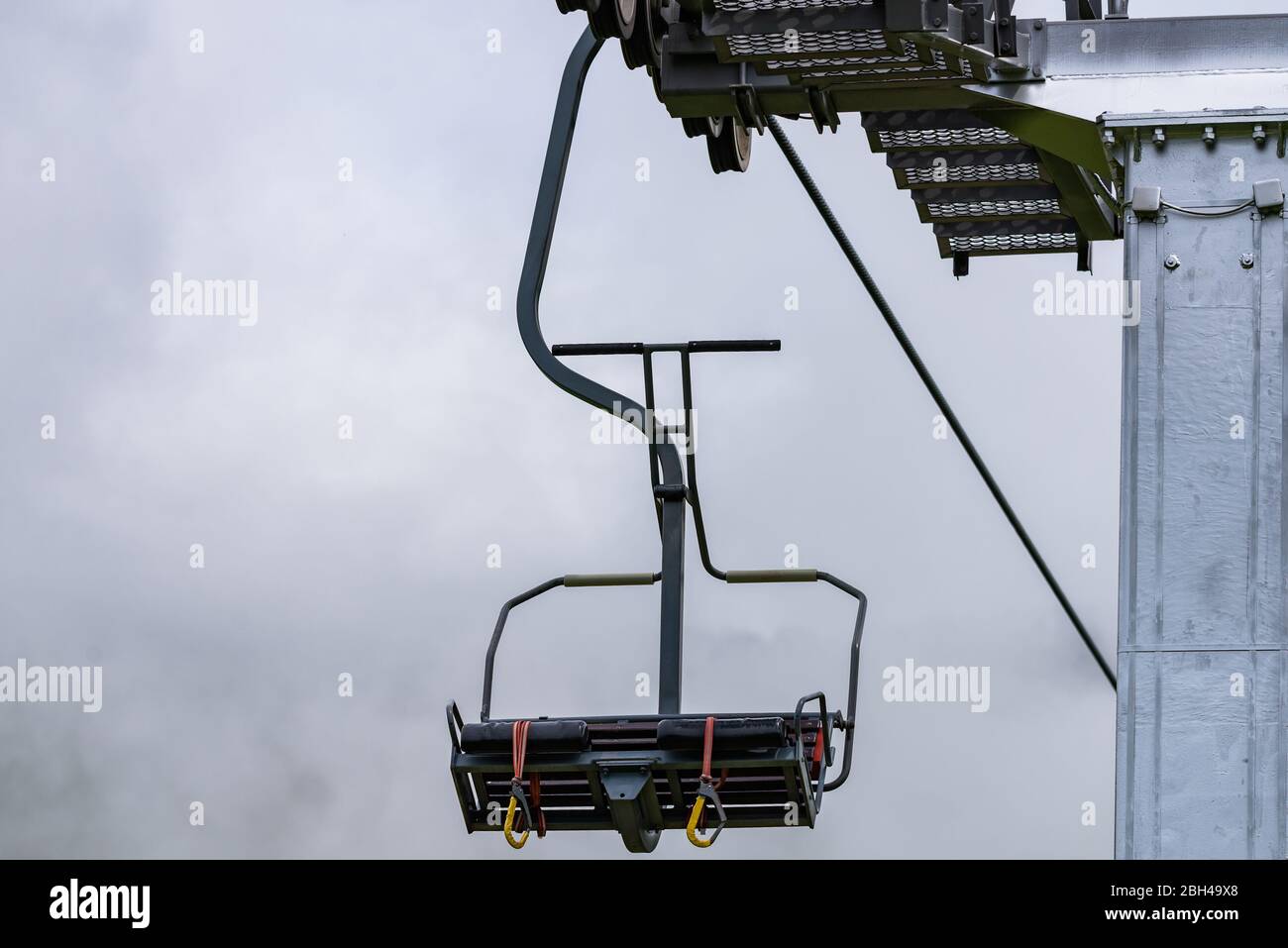 Funicular with seats in the mountains resort Stock Photo - Alamy